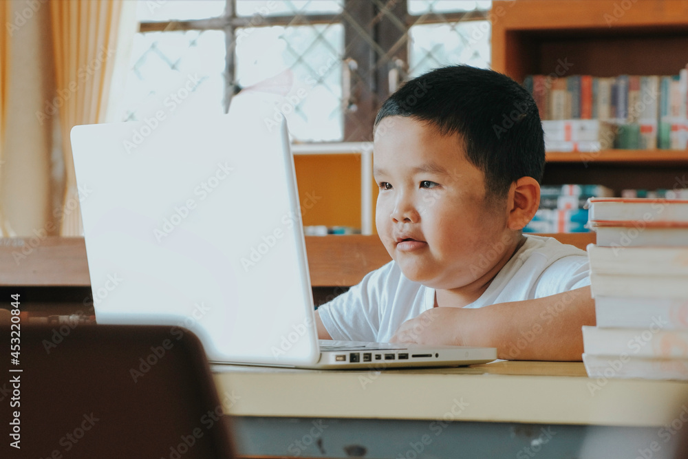 Back to School, Online learning, Asian little child using laptop ...