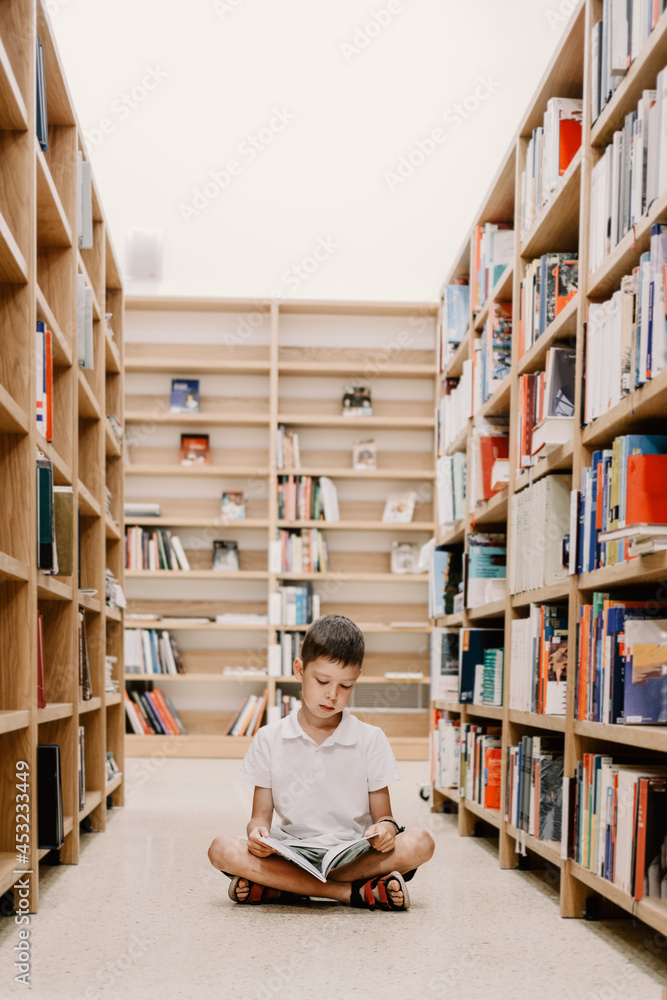 Kids Reading Books In Library