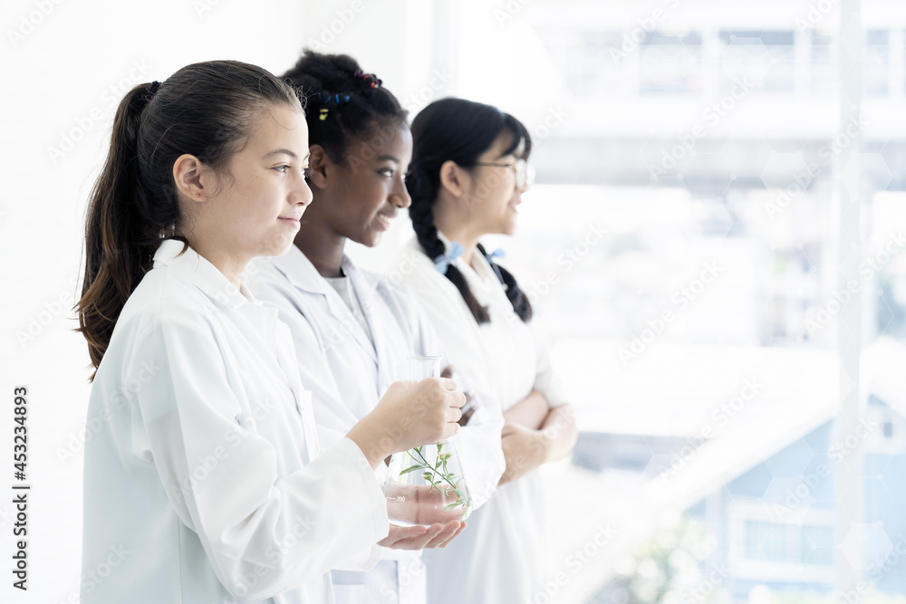 Stockfoto Group of diversity children scientists standing holding with ...