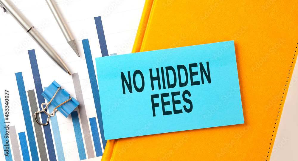 NO HIDDEN FEES text on sticker on the yellow notebook with chart and ...