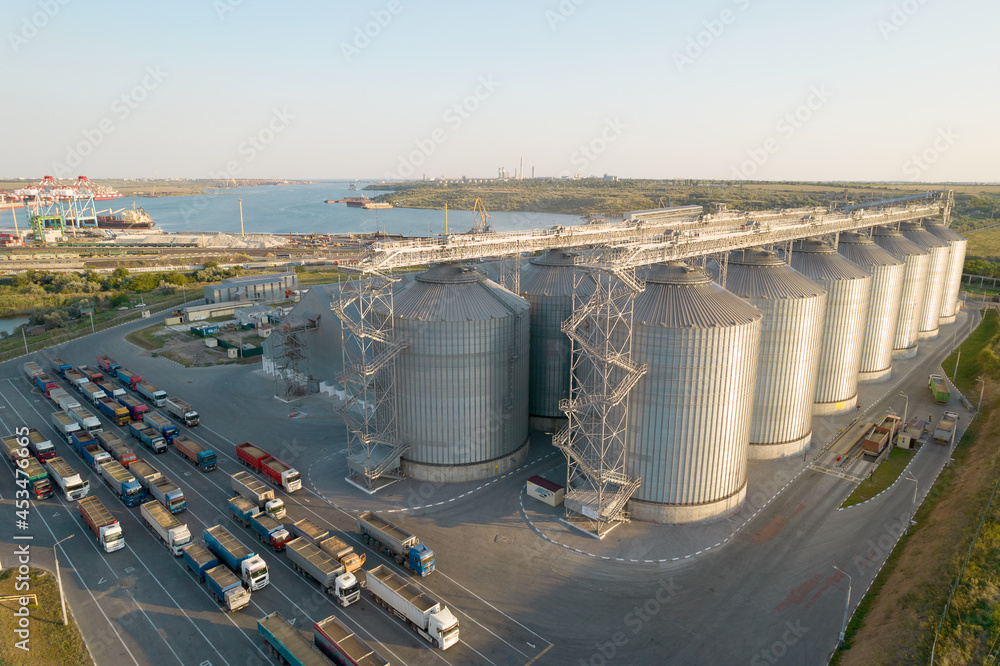 Grain terminals of modern sea commercial port. Silos for storing grain ...