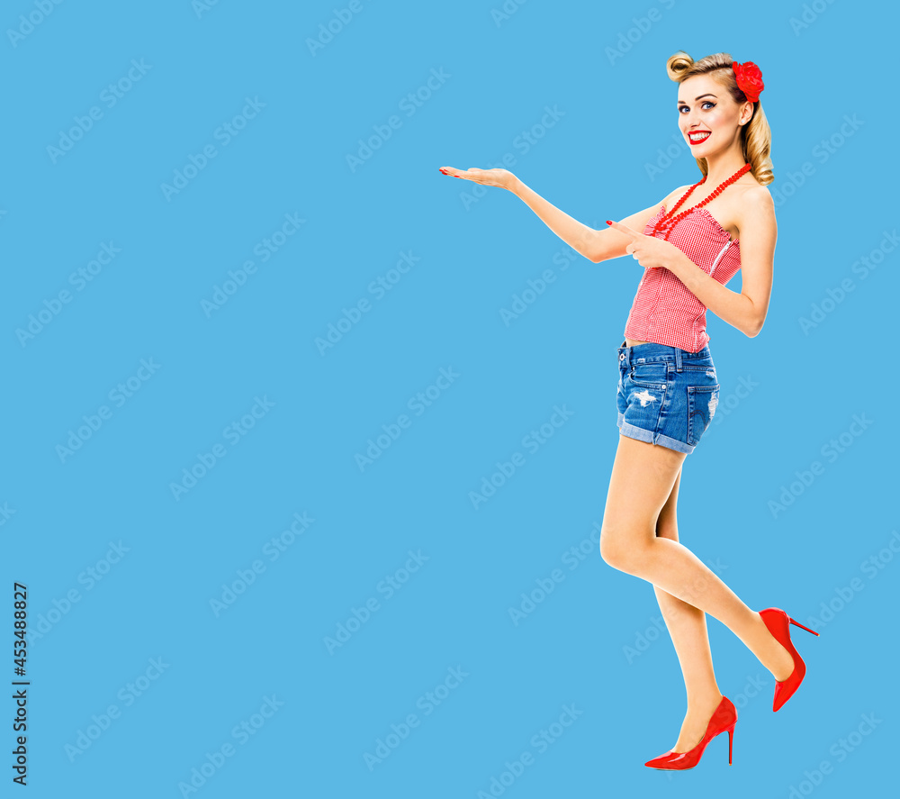 Full body photo of happy excited smiling woman holding, giving, promote ...