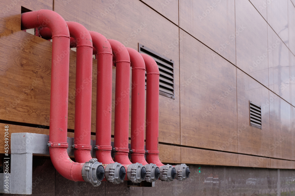 Fire hydrant beside wall for connecting to fire truck for support water ...