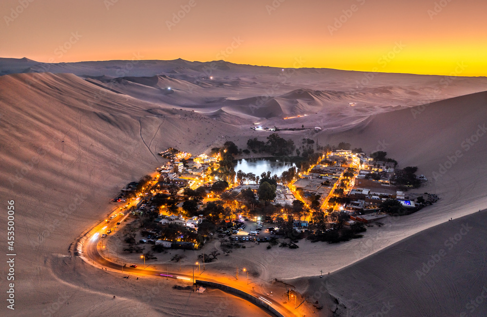 Aerial sunset view of the Huacachina Oasis in Peru ภาพถ่ายสต็อก | Adobe ...