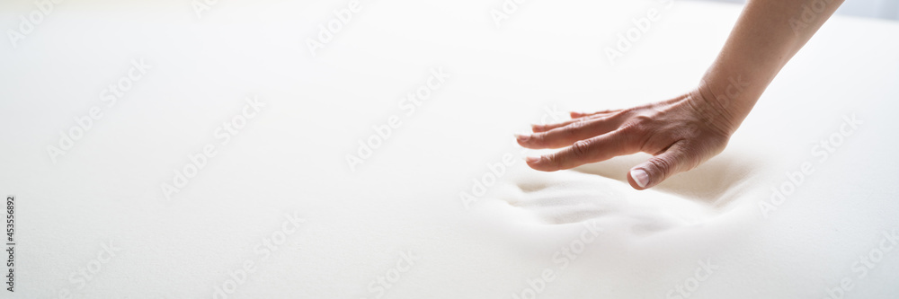 Testing Orthopedic Memory Foam Core Mattress Photos | Adobe Stock