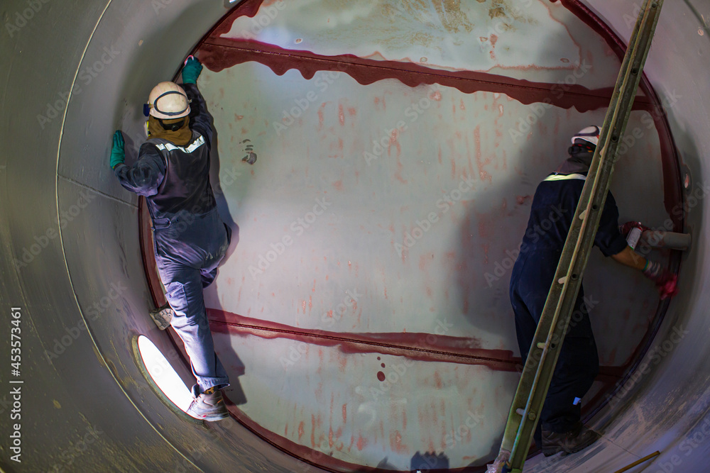 Working male two inspection weld PT test weldment for finding defect ...