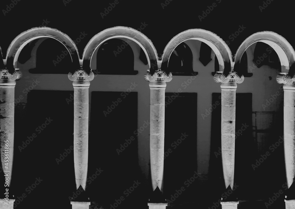 Light-up columns and arches of a Romanesque style architecture at night ...