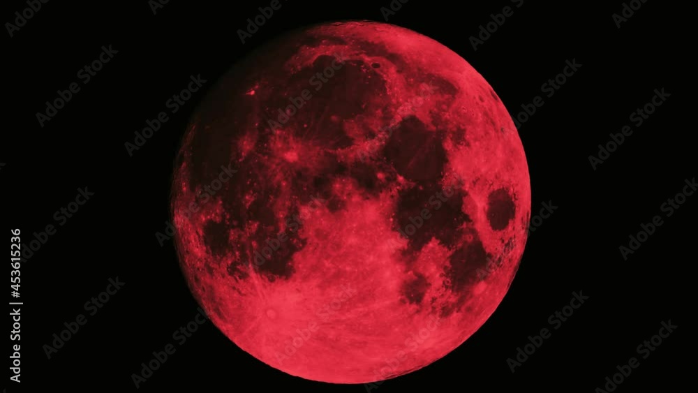 Closeup graded shot of the evil red full moon aka blood moon filmed ...