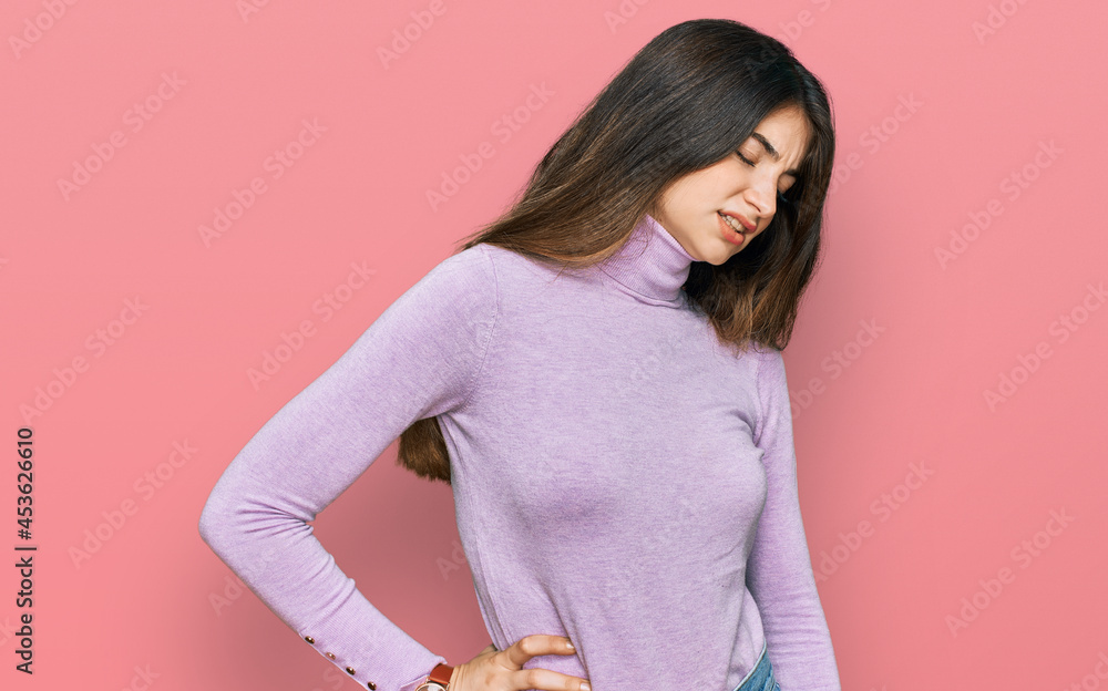 Young beautiful teen girl wearing turtleneck sweater suffering of ...