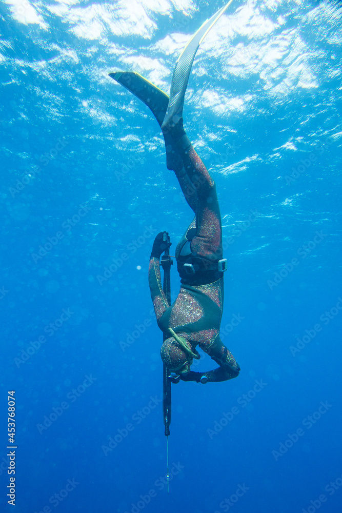 spearfishing in ocean Stock Photo | Adobe Stock
