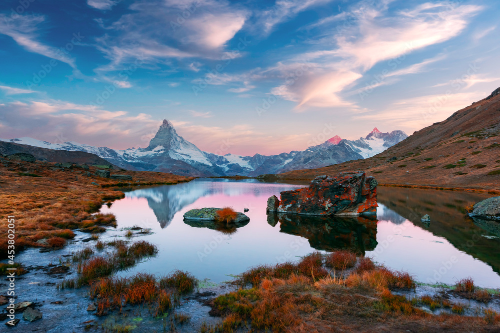 Incredible colorful sunset on Stellisee lake Stock Photo | Adobe Stock Incredible colorful sunset on Stellisee lake Stock Photo | Adobe Stock