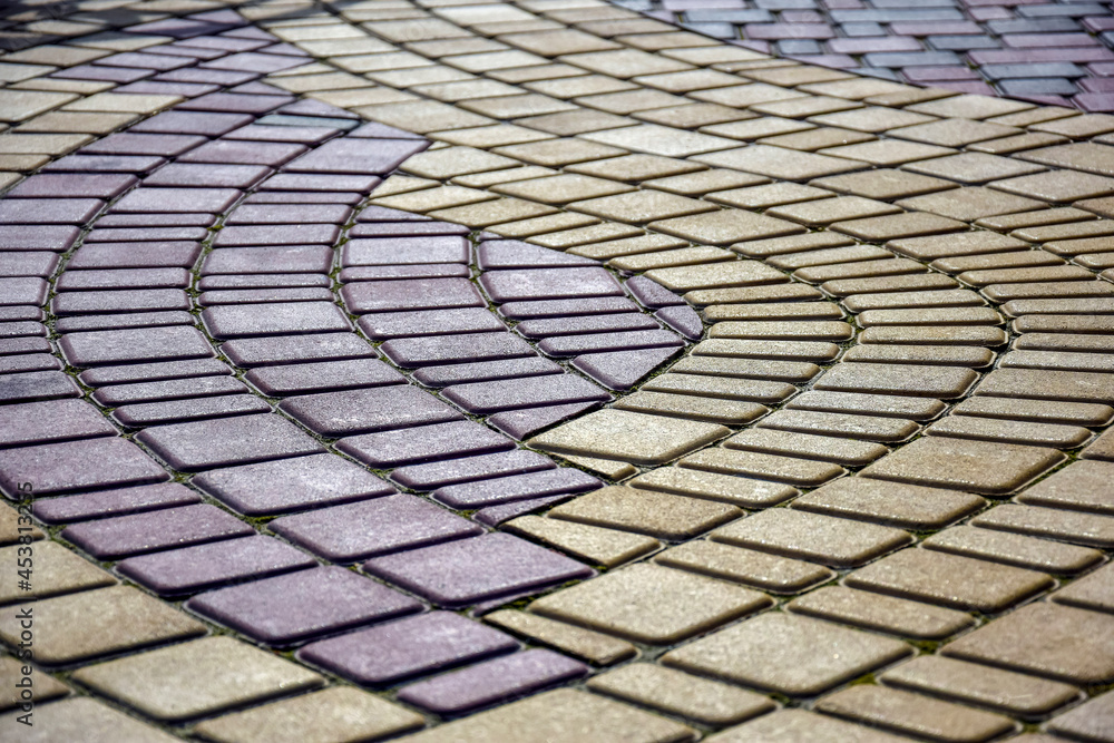 Sidewalk made of two-tone paving slabs. Arc-shaped pattern. Side view ...