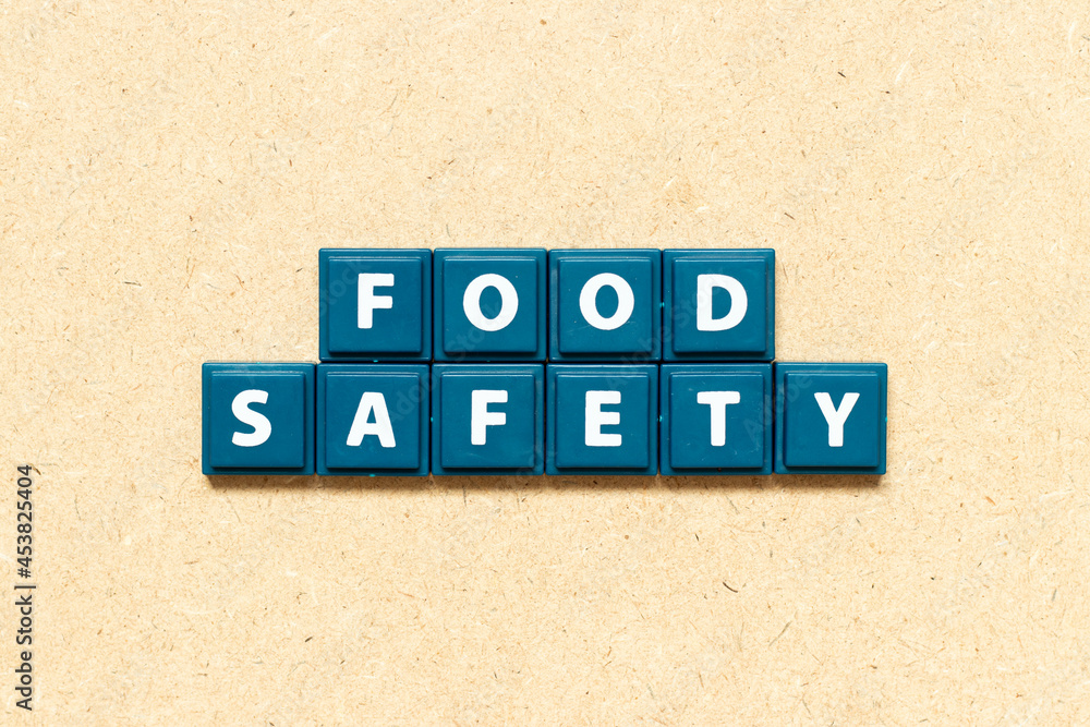 Tile alphabet letter in word food safety on wood background Stock Photo ...