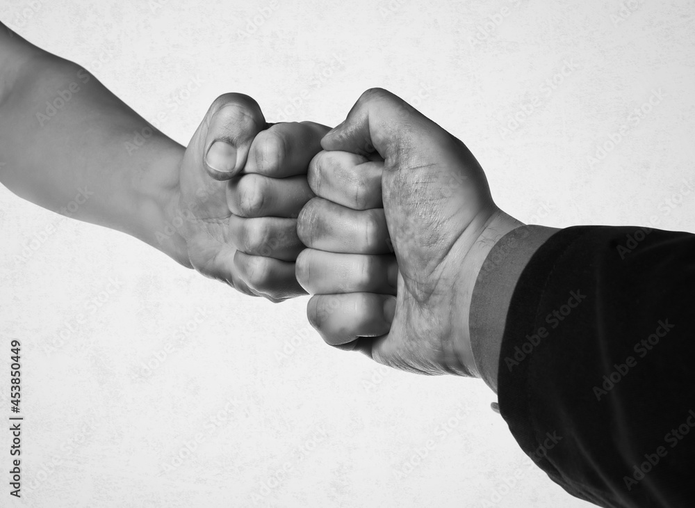 Clash of two fists. Concept of confrontation, fight, domestic violence ...