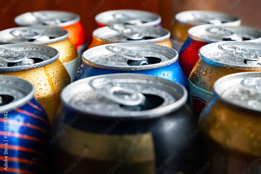 Beer cans. Aluminum cans. Close-up of lots of colorful empty cans with ...