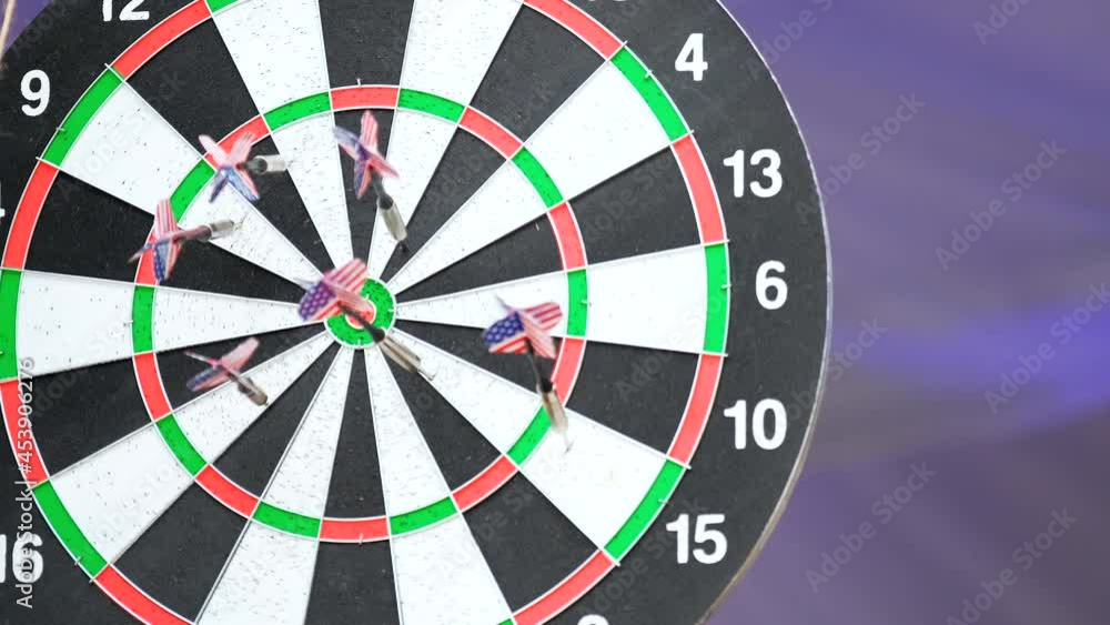 Accurate throws dart with american flag in goal closeup. Aiming sport ...