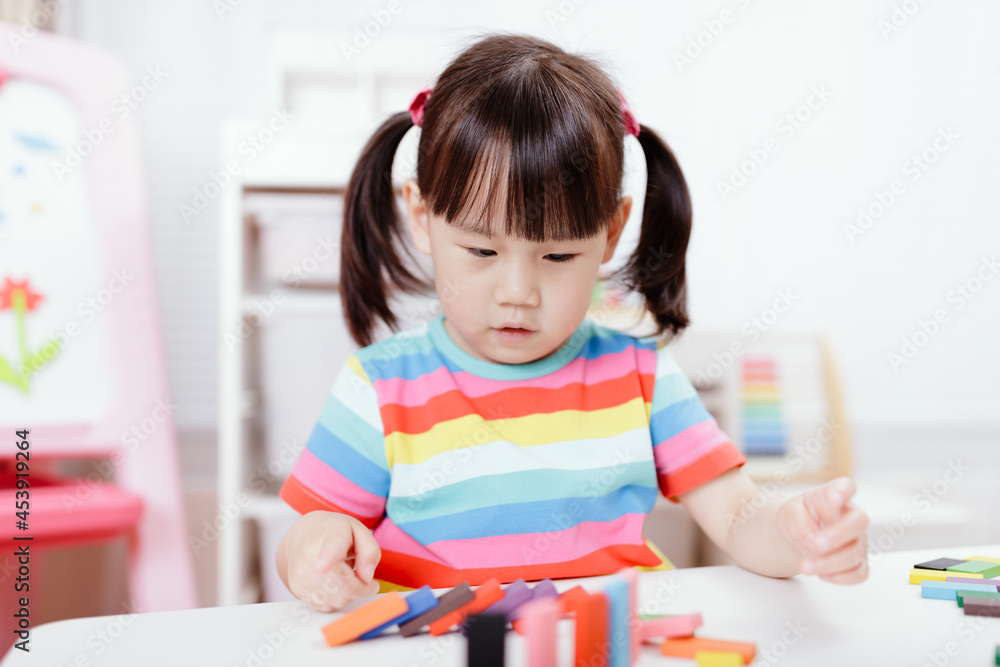 young girl play number sticks fine motor skill game for homeschooling ...