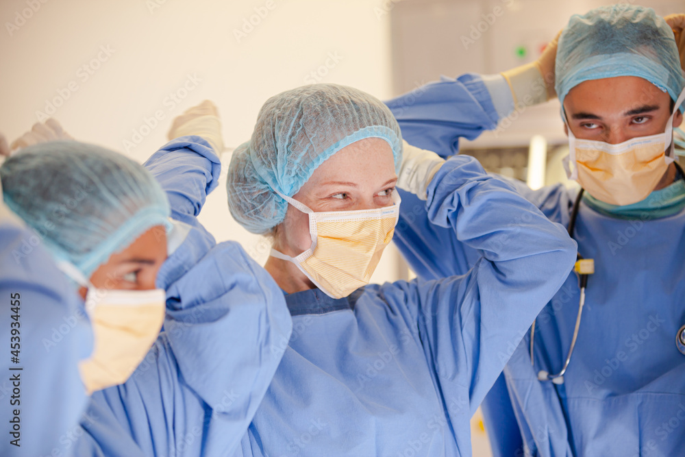 Surgeons talking in operating room Stock Photo | Adobe Stock