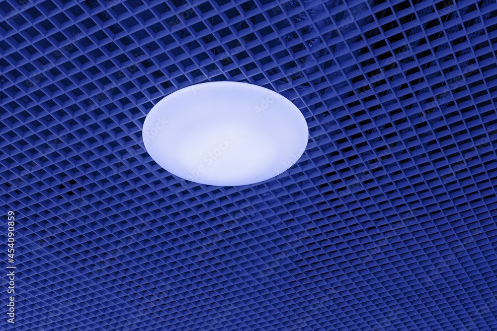 Round shape LED lighting lamp on ceiling in shopping center building ...
