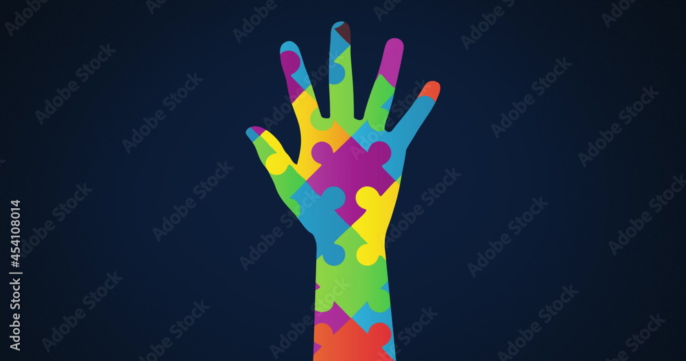 Image of multi coloured puzzle elements forming hand, symbol of Autism ...