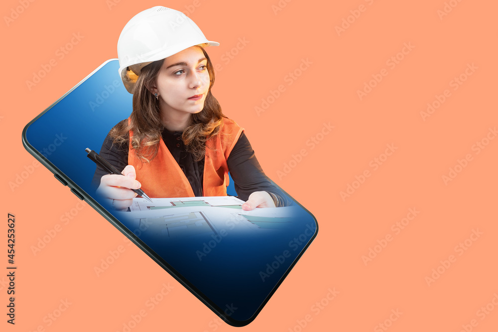 Foto de Woman architect draws construction drawings. Concept services ...