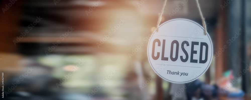 Closed sign in front of door café and shop, new normal and start ...