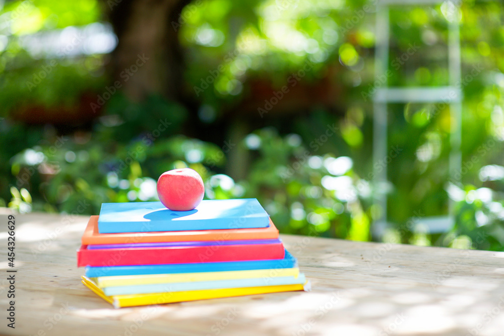 Apple on books and table.Homeschool, homeschooling and schooling ...
