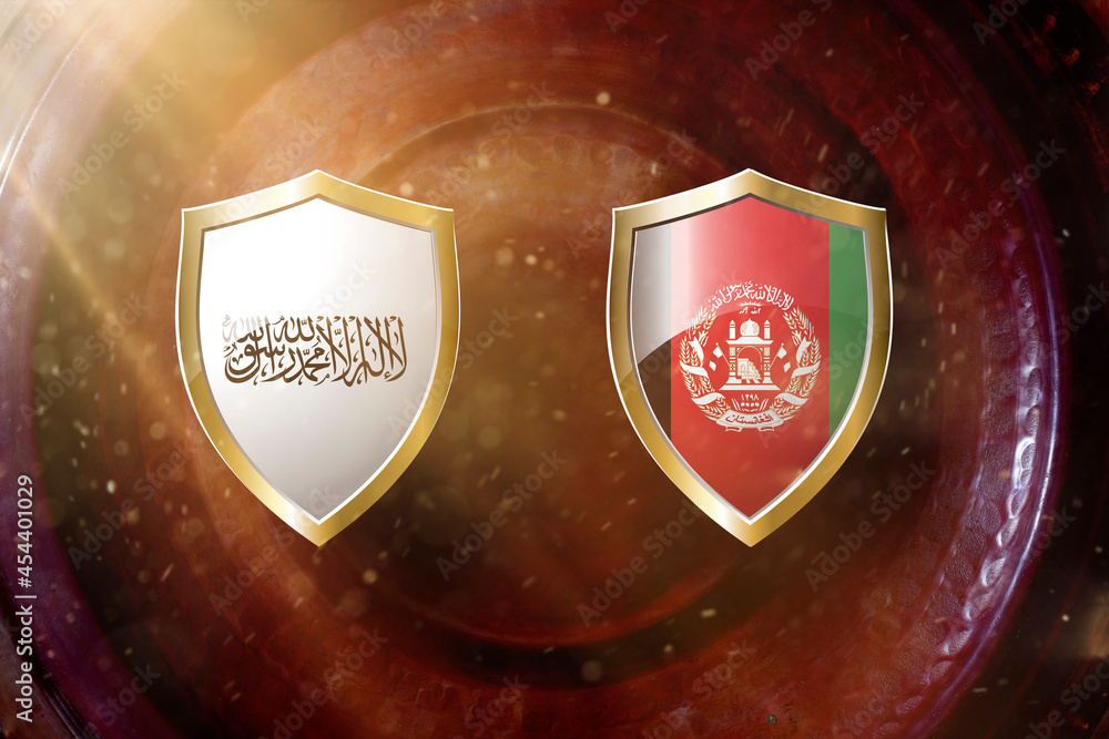 taliban and afghanistan flag in golden shield on copper texture ...