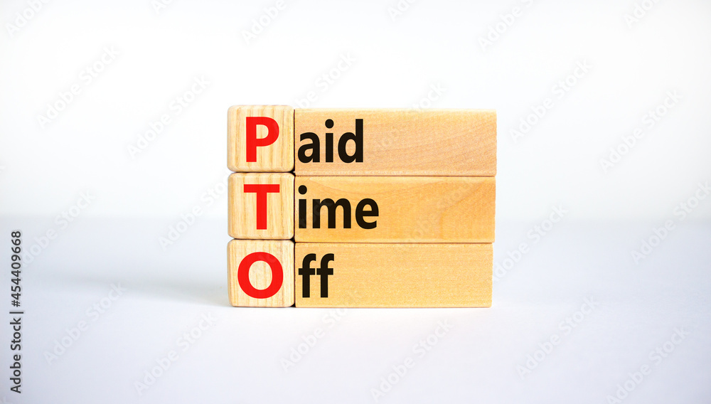 PTO, Paid time off symbol. Wooden blocks with concept words 'PTO, Paid ...