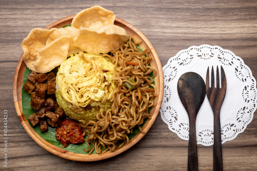 Nasi Kuning or Sego Kuning, Indonesian traditional food with fried ...