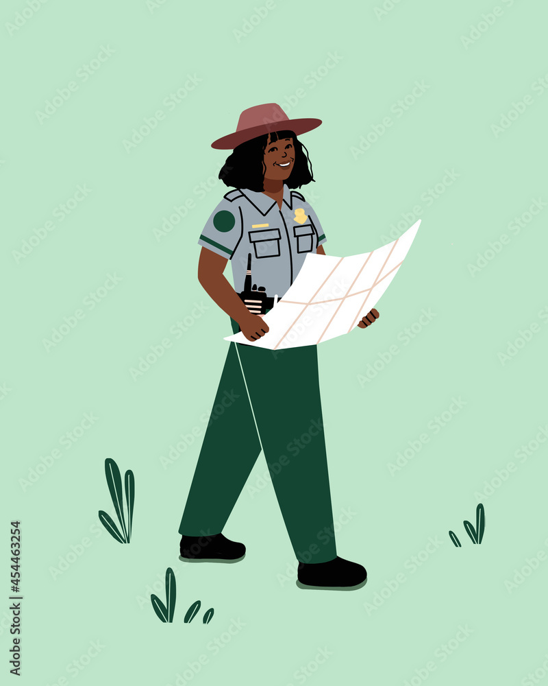 Female forest ranger on duty in a national park. Park ranger walking on ...