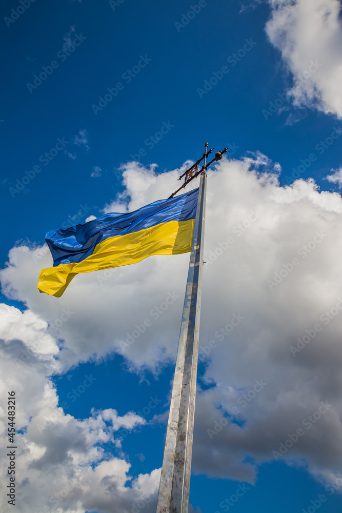 Flag of Ukraine on blue sky background. Flag of ukraine on a flagpole ...