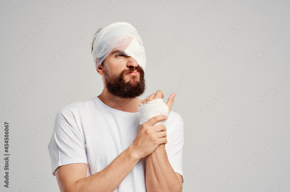 sick man with bandaged head and eye hospitalization hospital medicine ...
