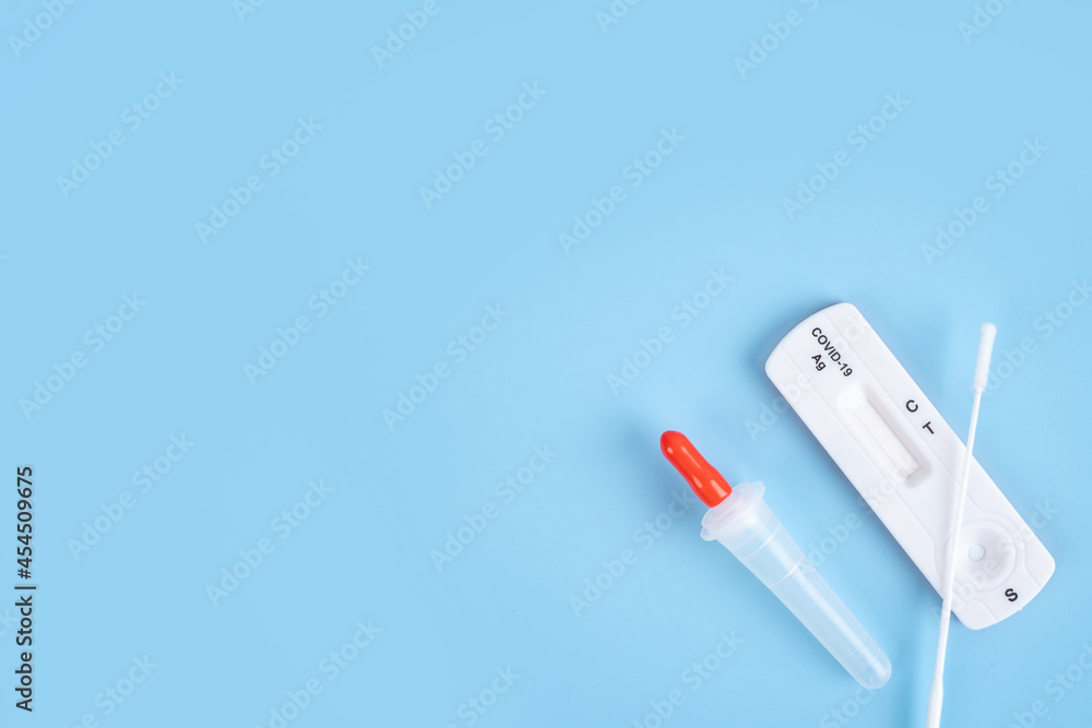 Rapid antigen test, top view isolated blue background with copy space ...