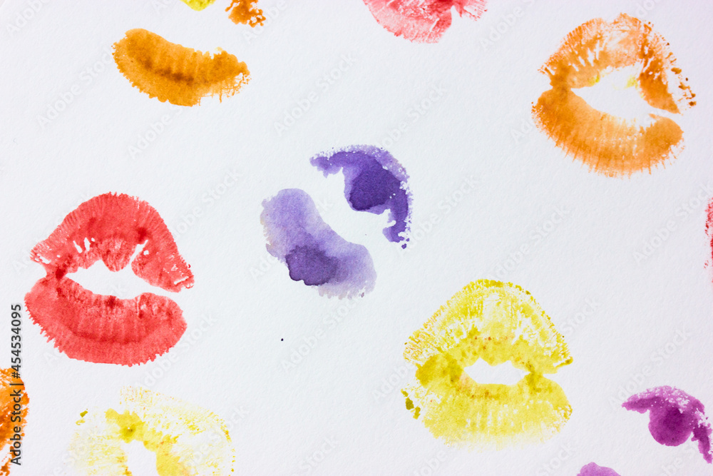 Set of multicolored female lip prints on white paper background top ...