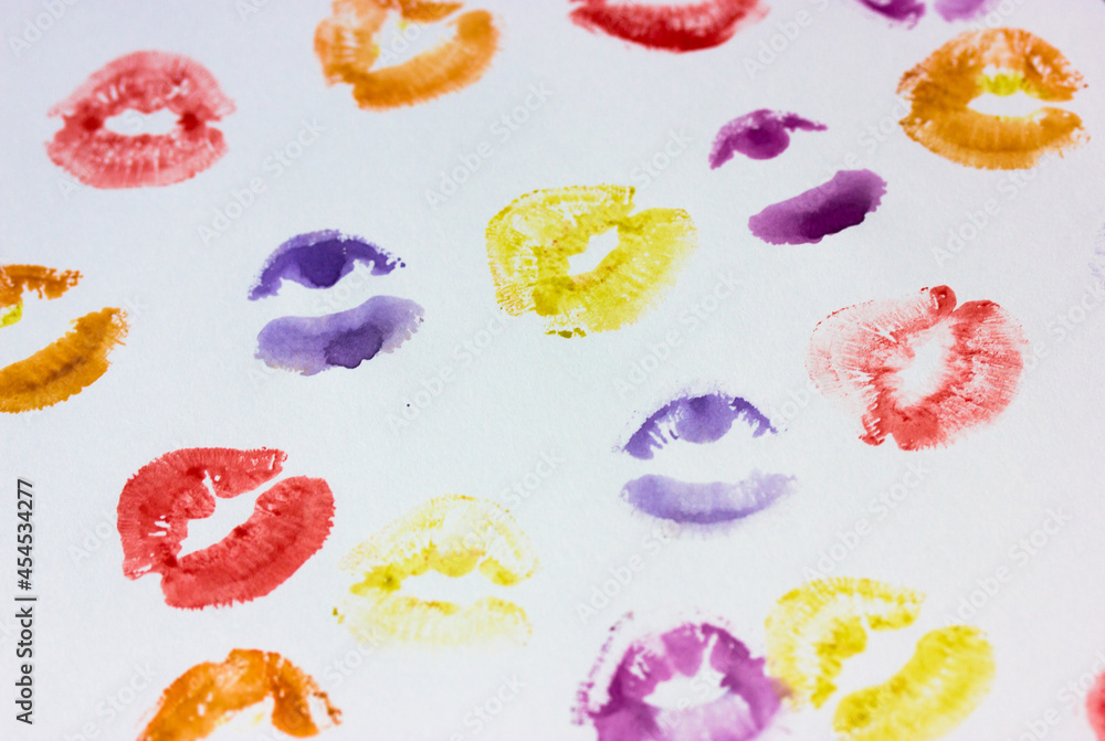 Set of multicolored female lip prints on white paper background top ...