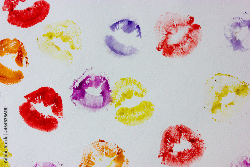 Set of multicolored female lip prints on white paper background top ...
