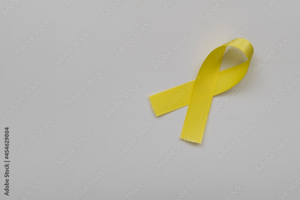 yellow ribbon of the suicide prevention campaign. Ribbon isolated on ...