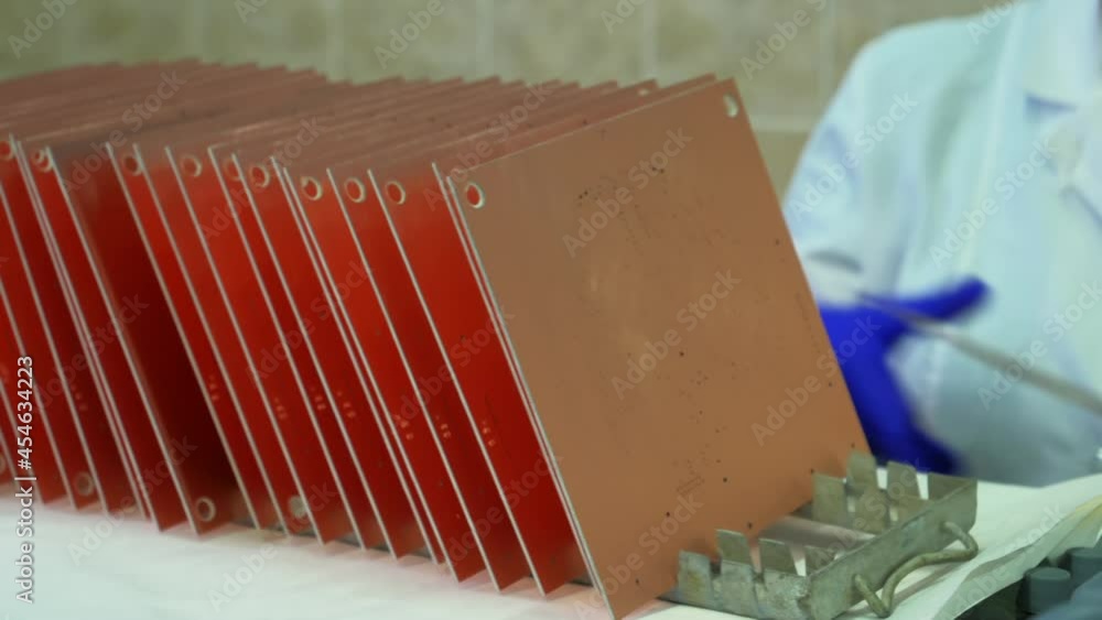 Operator is Placing Board in a Metal Organizer. Management of Pieces ...