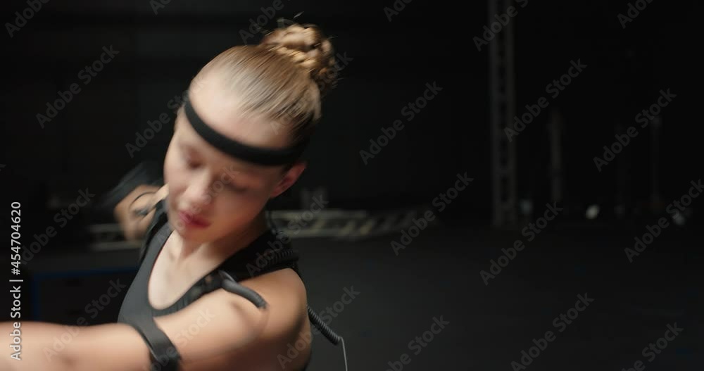 dancing woman wearing motion capture suit in studio ballet dancer girl ...