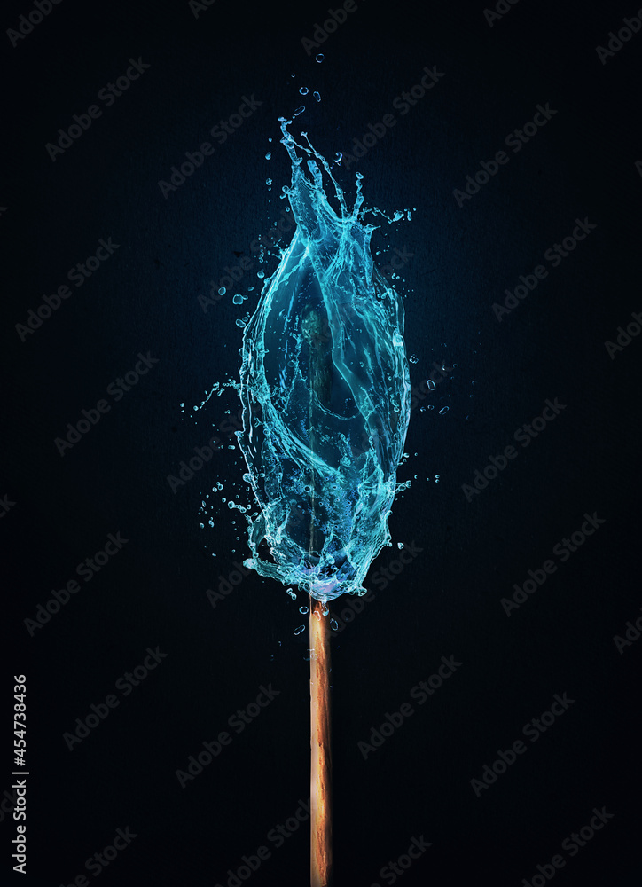 Different thinking concept as an unusual matchstick burning in a water ...