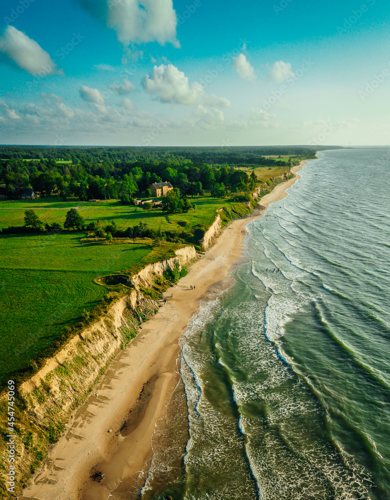 Aerial Top view shot of an empty sand beach Sand Sea Shore with a wave ...