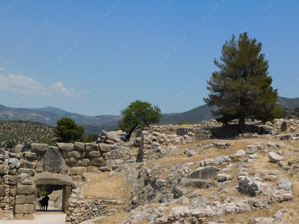 Trees near the main gate and walls of the ancient prehistoric citadel ...
