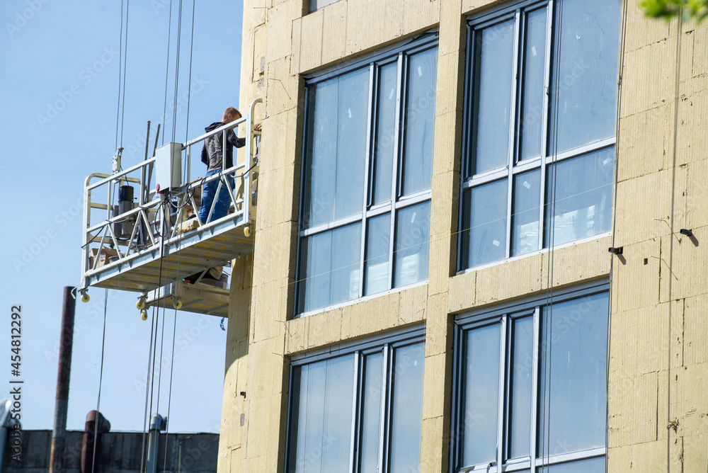 Building external wall thermal insulation with mineral wool. Exterior ...