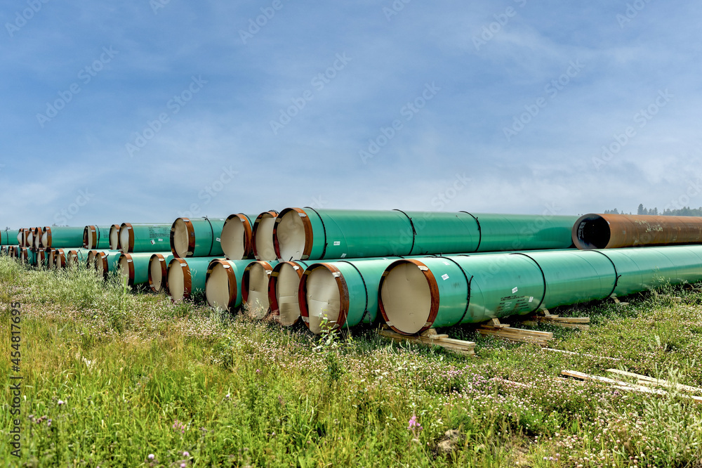 Pipe lengths for a crude oil pipeline in a storage yard in Alberta ...