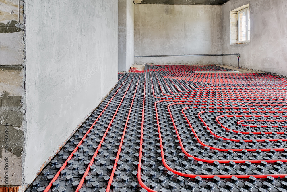 Installation of a heat flooring system in a country house under ...