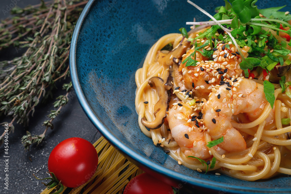 Tom Yum pasta with shrimp. Thai dishes. Spaghetti Tom Yum Goong, a ...