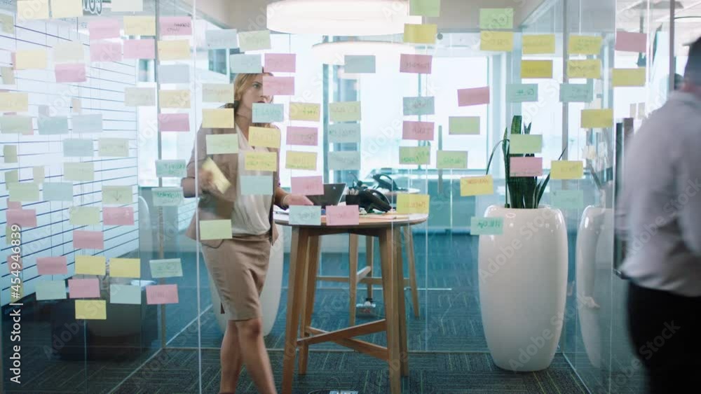 beautiful business woman using sticky notes brainstorming ideas ...
