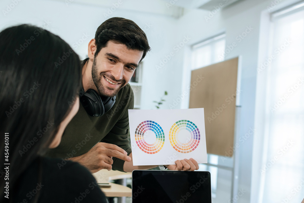 Creative people. smart graphic designer man showing and working with ...