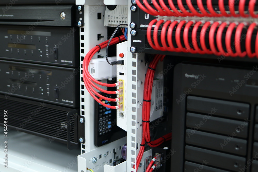 Connecting patch cords to an Ethernet switch and patch panels installed ...